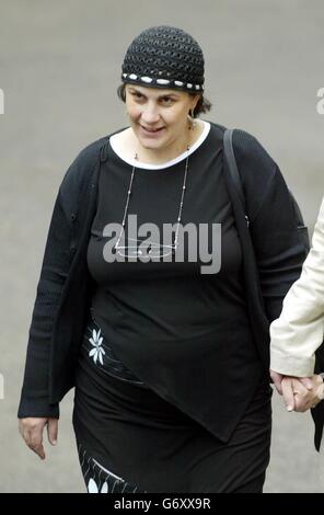 Nathalie Atter and her husband leaving the high court in London. A ...