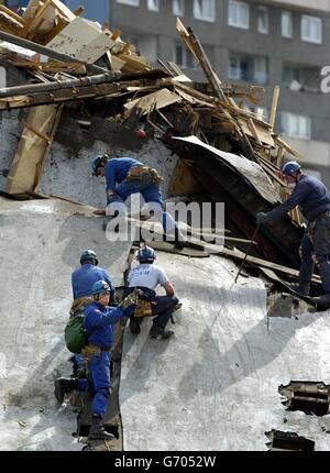 Rescue services continue looking for survivors at the Stockline ...