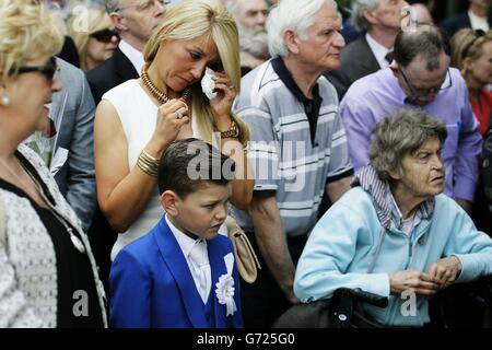 Wendy Doherty and her son Tyler, eight, from Lucan, attend a wreath ...