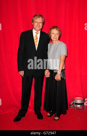 David Neilson and guest arriving for the 2014 British Soap Awards at ...