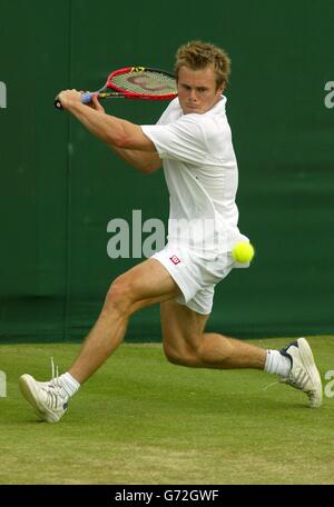 Great Britain's Mark Hilton in action before defeating Albert Costa ...