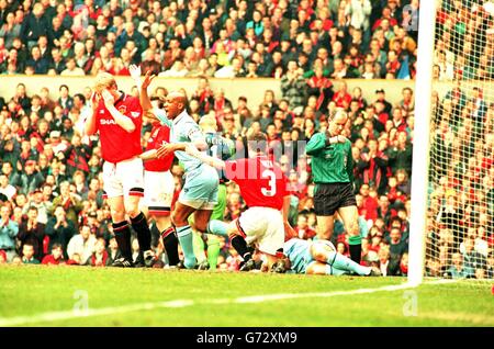 A horrific injury for Dave Busst of Coventry City (no 12) during a ...
