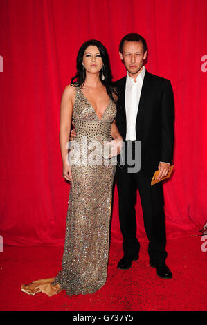 Ria Lewis and Adrian Lewis-Morgan arriving for the 2014 British Soap ...