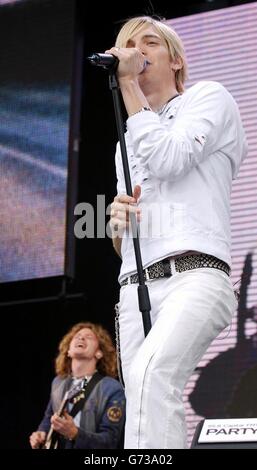 The Calling lead singer Alex Band is shown performing on stage during ...