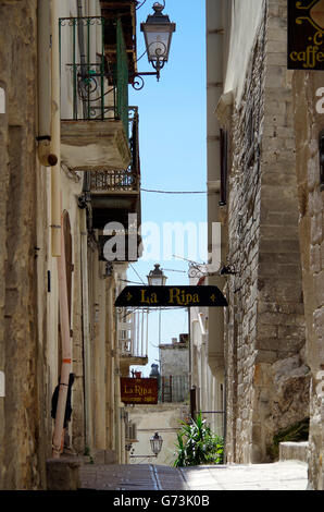 Narrow street and steps in Vieste, Gargano, Puglia, Italy Stock Photo ...