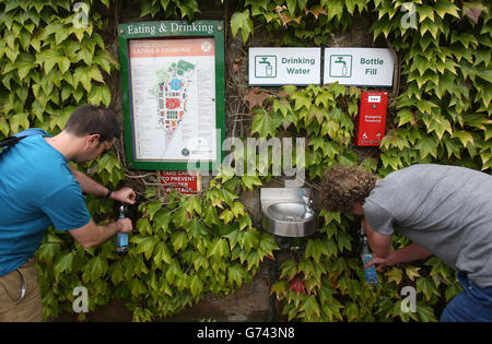 Spectators fill up water bottles on day three of the Lexus Eastbourne ...