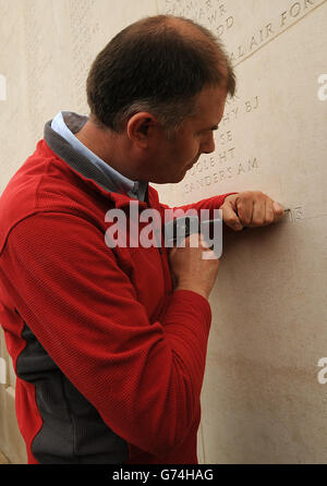 Engraver Nick Hindle engraves the names of UK Armed Forces personnel ...