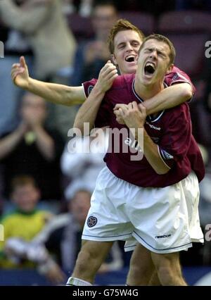Hearts Paul McMullan (front) celebrates his first goal with Alan ...