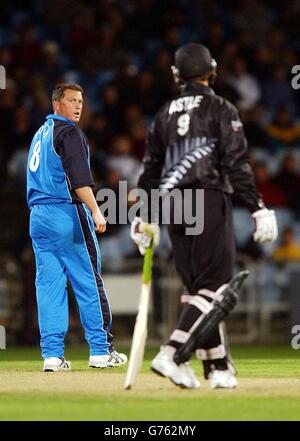 New Zealand's Nathan Astle (left) hits England's Darren Gough (right ...