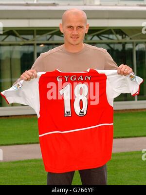 Arsenal's new signing Pascal Cygan clear the ball away from Stevenage ...