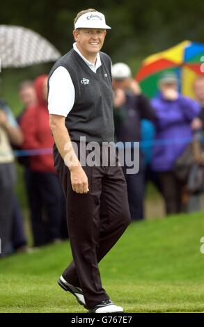 Scotland's Collin Montgomerie finishes the 17th hole on his way to a ...