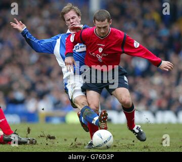 Crewe Alexandra's Kenny Lunt (R) challenges Leeds' Sean Gregan during ...
