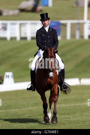 New Zealand's Tim Price, riding Falco, gestures, during the equestrian ...