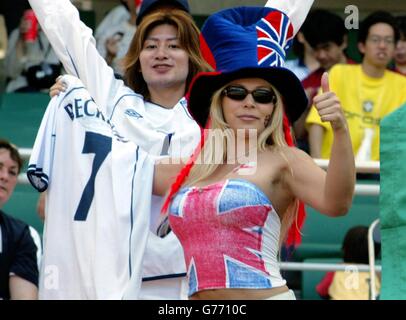 An England fan in the stands ahead of the FIFA World Cup Group L match ...