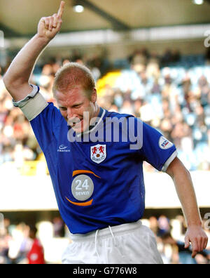 Millwall's captain Stuart Nethercott celebrates scoring his side's goal ...
