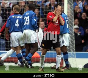 Manchester City face a free kick: (l-r) Manchester City's Ray Ranson ...