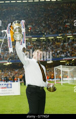 Wolves manager Dave Jones celebrates with his coaches after thier 3-2 ...