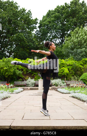 Energetic active flexible woman jazz dancer dancing with high kick ...