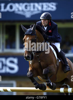 Robert Whitaker of Great Britain riding Vermento during the jump-off of ...