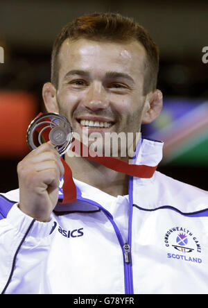 Scotland's Viorel Etko with his bronze medal from the FS 61 kg ...