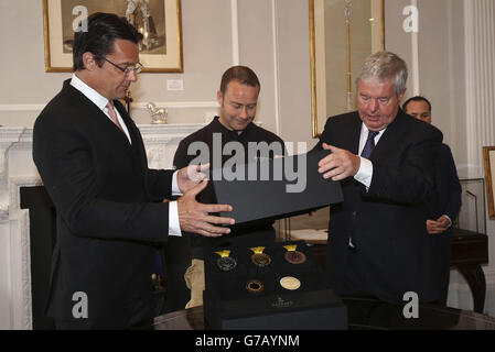 (left to right) Garrard CEO Eric Deardorff, Sergeant Craig Gadd and ...