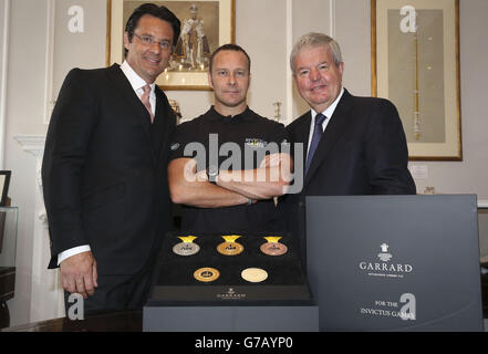 (left to right) Garrard CEO Eric Deardorff, Sergeant Craig Gadd and ...