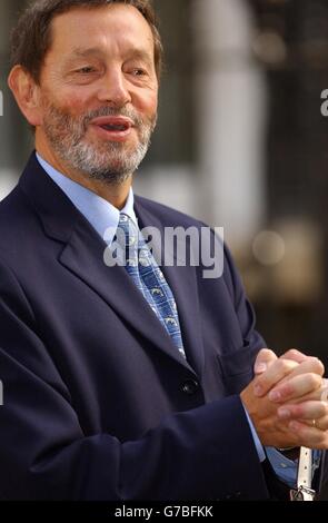The Home Secretary David Blunkett arrives with his guide dog Sadie, at ...