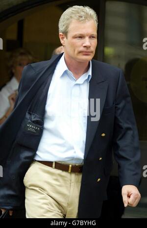 Sion Jenkins leaves court the Old Bailey with his wife. The jury in the ...