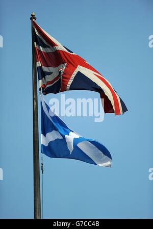 The Union Flag and Scottish Saltire fly side by side on the Royal Mile ...