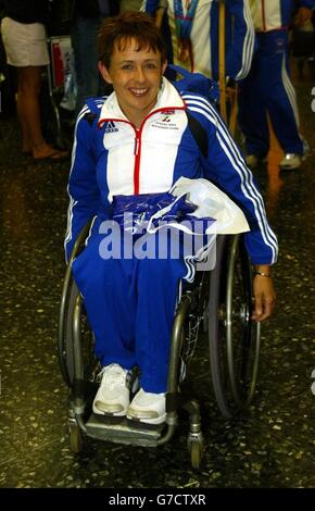 British wheelchair athlete Tanni Grey-Thompson (L) and her family pose ...