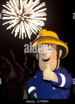 An actor dressed as Fireman Sam at the Brockwell Park fireworks display ...