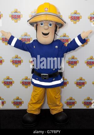An actor dressed as Fireman Sam at the Brockwell Park fireworks display ...
