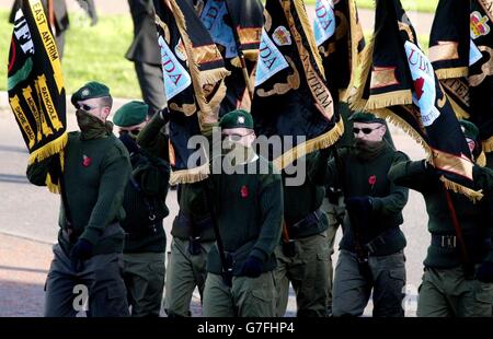 Masked members of the Ulster Defence Association (UDA) on parade in ...