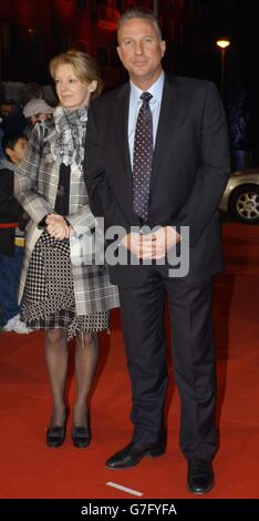 Cricketer Ian Botham with his wife Kathy after receiving his OBE from ...