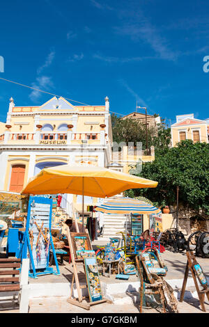 A beautiful view of the Symi Harbor on Symi Island, Greece with boats ...