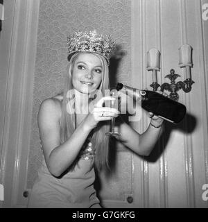 The newly-crowned Miss World, Austrian model Eva Rueber-Staier pours ...
