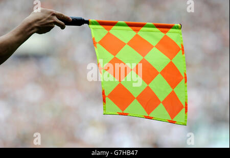 Flag of the assistant referee indicating offside, qualifier for the ...