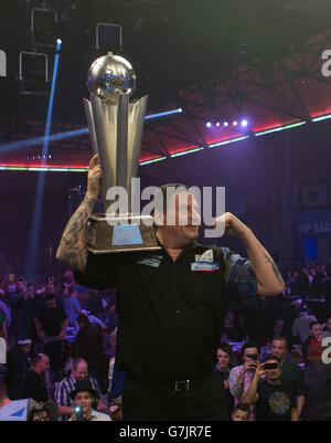 Gary Anderson celebrates with the Sid Waddell trophy after winning the ...