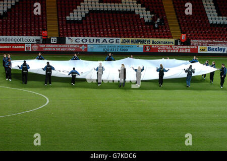 Flag bearers from Long Lane FC, hold the London "Make Britain Proud ...