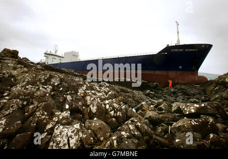Container ship runs aground Stock Photo - Alamy