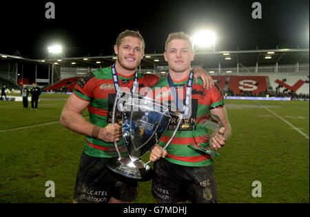 George and Tom Burgess of the South Sydney Rabbitohs stand on the ...