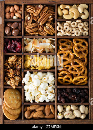 Nuts variety. Many different nuts, shot from the top on a vibrant blue ...