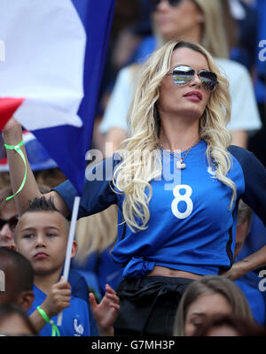 Ludivine Payet, wife of Dimitri Payet, with her son Milan Payet Stock ...