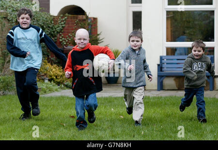 Daniel Hartley, 8 (second from right) is re-united with his parents ...