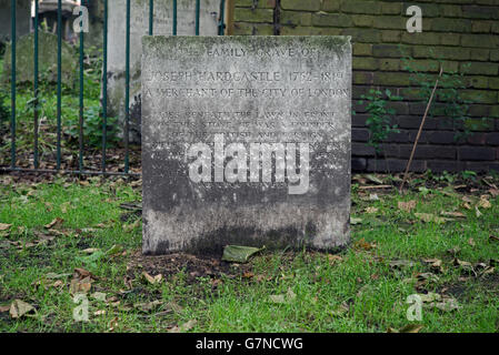A headstone in a cemetery marks the grave of a young girl who died in ...
