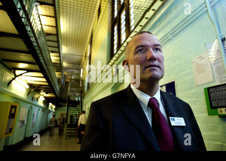 Governor of Chelmsford Prison Steve Rodford stands on the A wing of the ...