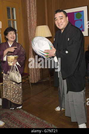 TOKYO, Japan - Sumo grand champion Hakuho (C) and his wife Sayoko give ...