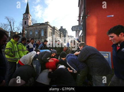 Players dive for the ball in the Hand Ba game, traditionally played on ...