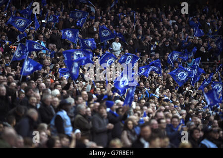 Chelsea fans wave flags in the sunshine during the match - Chelsea v ...