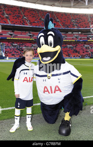 Tottenham Hotspur club mascot Chirpy Cockerel (centre) and the Chelsea ...
